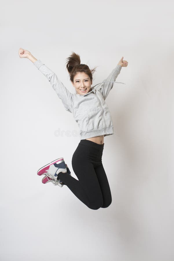 Woman jump stock photo. Image of length, jump, excited - 92929422