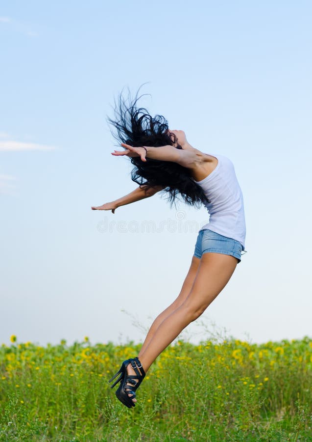 Woman jumping for joy stock photo. Image of energy, energetic - 26206080