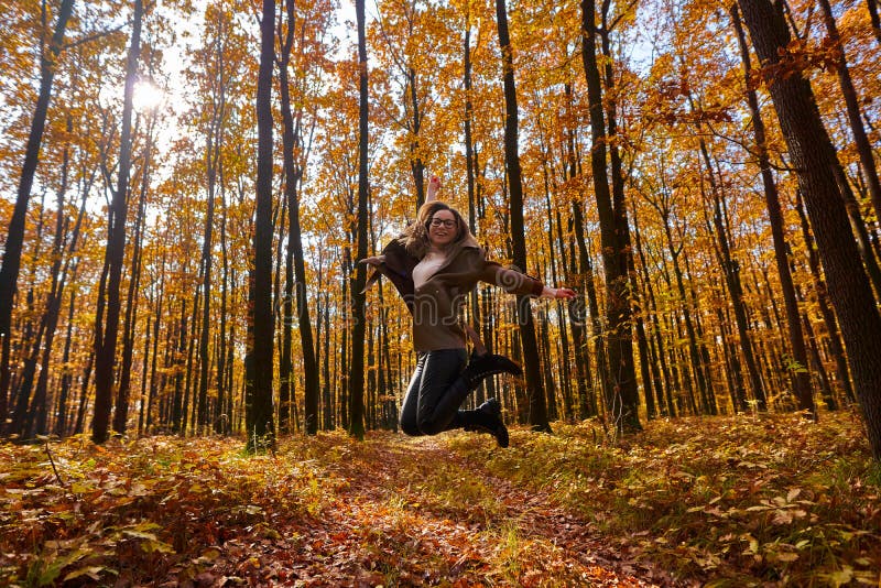 695 Woman Jumping Joy Forest Stock Photos - Free & Royalty-Free Stock ...