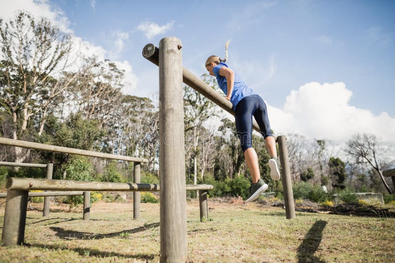 Woman Jumping Over the Hurdles during Obstacle Course Stock Photo ...