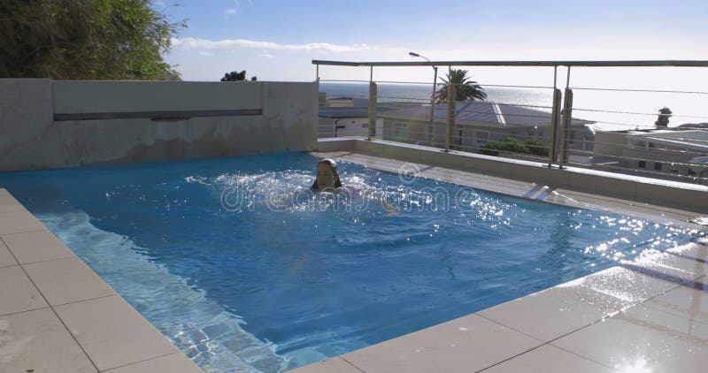 Woman Jumping into Pool Fully Clothed Stock Video - Video of highdef ...