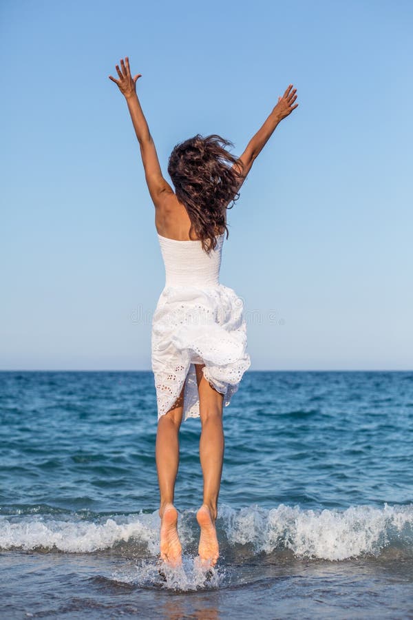 Woman Jumping in a Sea Water. Stock Photo - Image of ocean, summertime ...