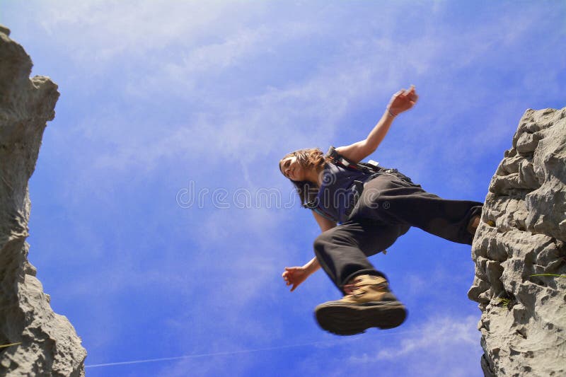 Woman jumping stock photo. Image of hiking, young, rocks - 43076484