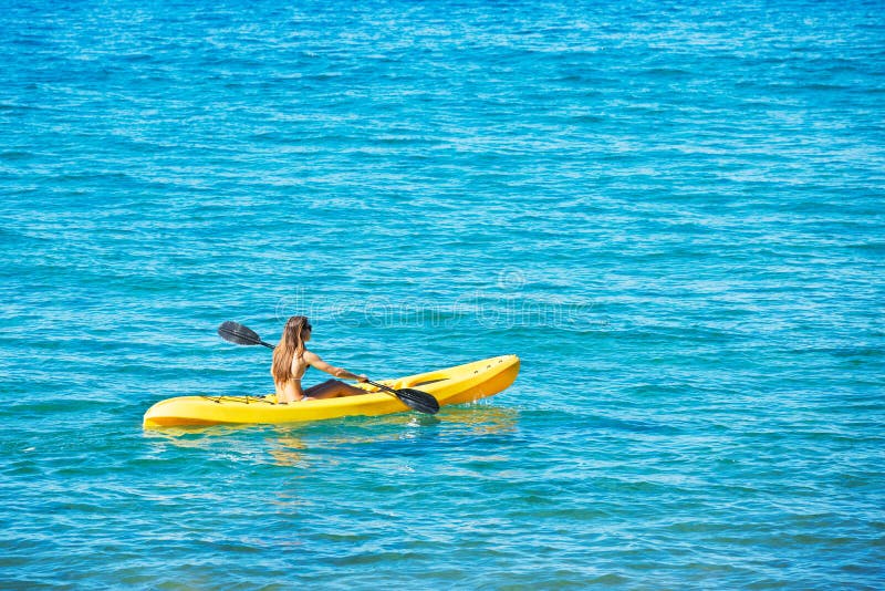 Woman Kayaking in the Ocean on Vacation Stock Image - Image of maui ...