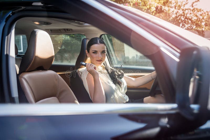 Woman with Keys Inside Car on Driver Seat Stock Image - Image of ...