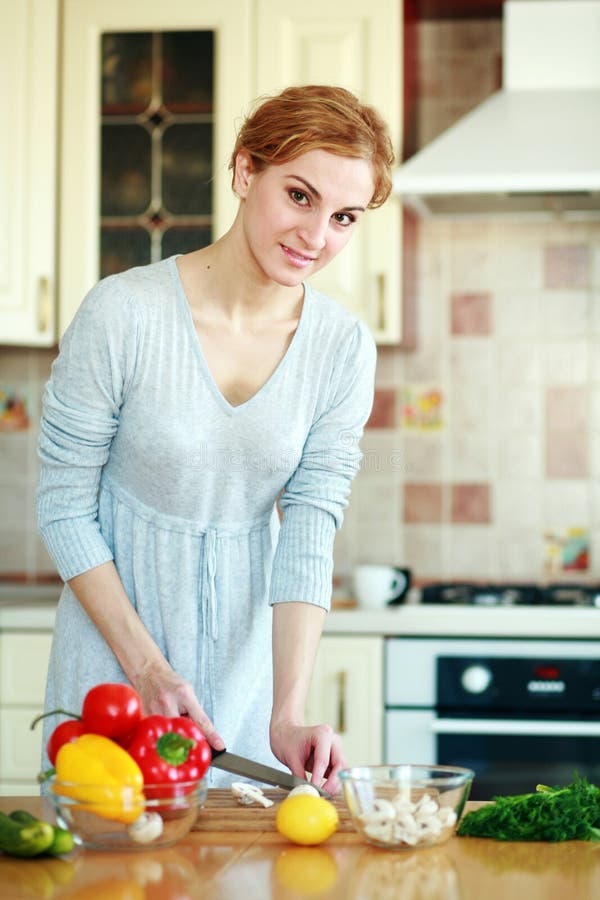 Woman in the kitchen stock photo. Image of knife, female - 11956066