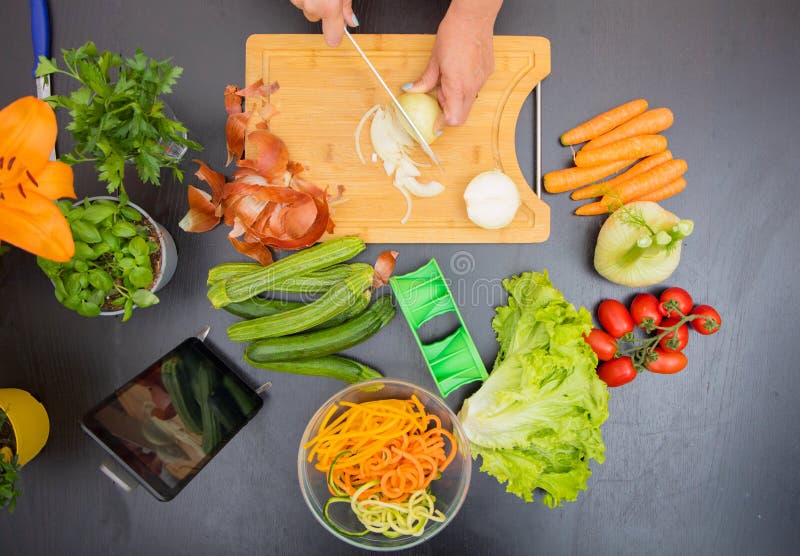 Woman in Kitchen Following Recipe on Digital Tablet Stock Photo - Image ...