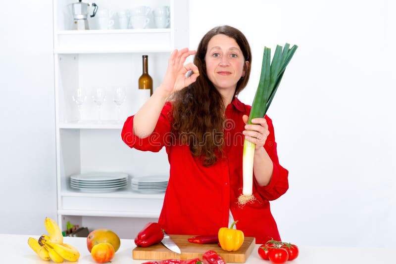 Woman the Kitchen Showing Delicious Gesture Stock Image - Image of ...