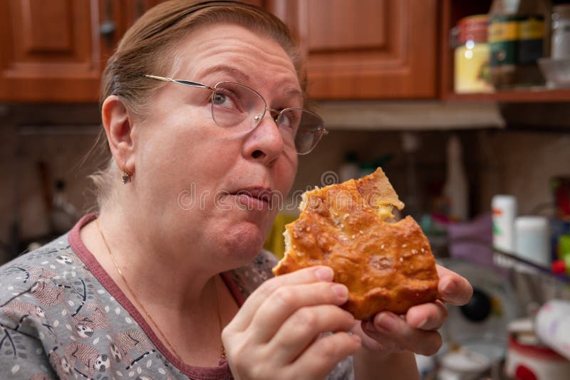Woman in the Kitchen Tasting the Pie she Baked Stock Image - Image of ...
