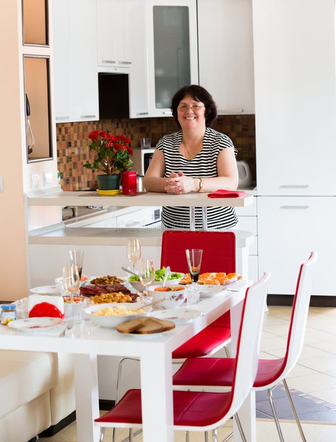 Woman in Kitchen is Waiting for the Guests Stock Image - Image of ...
