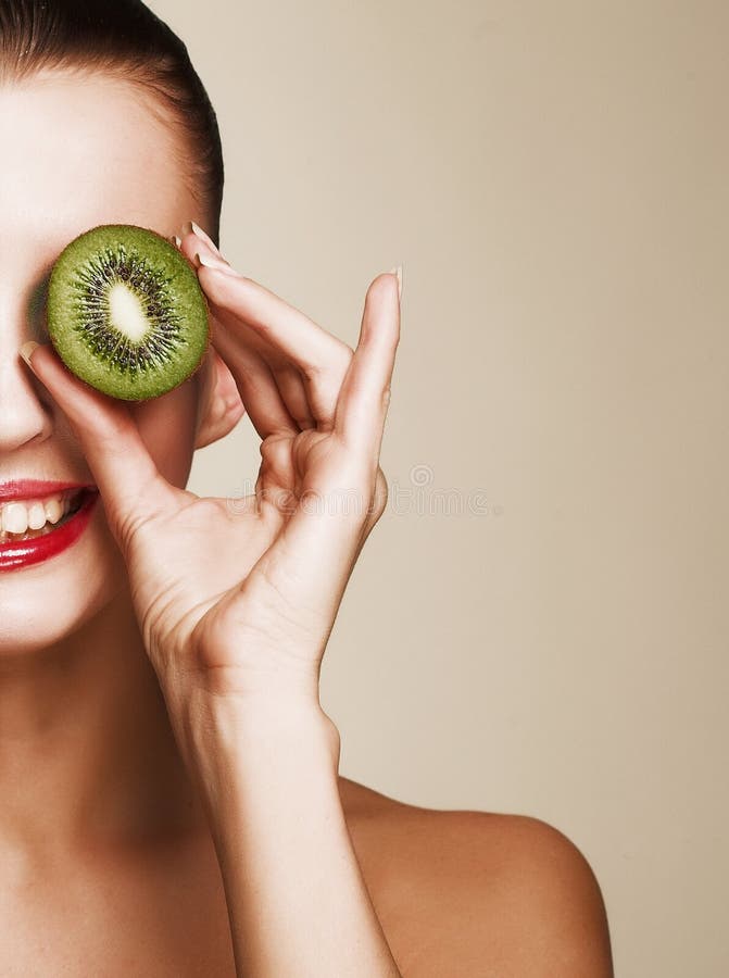 Woman with kiwi stock photo. Image of lips, health, isolated - 10807566
