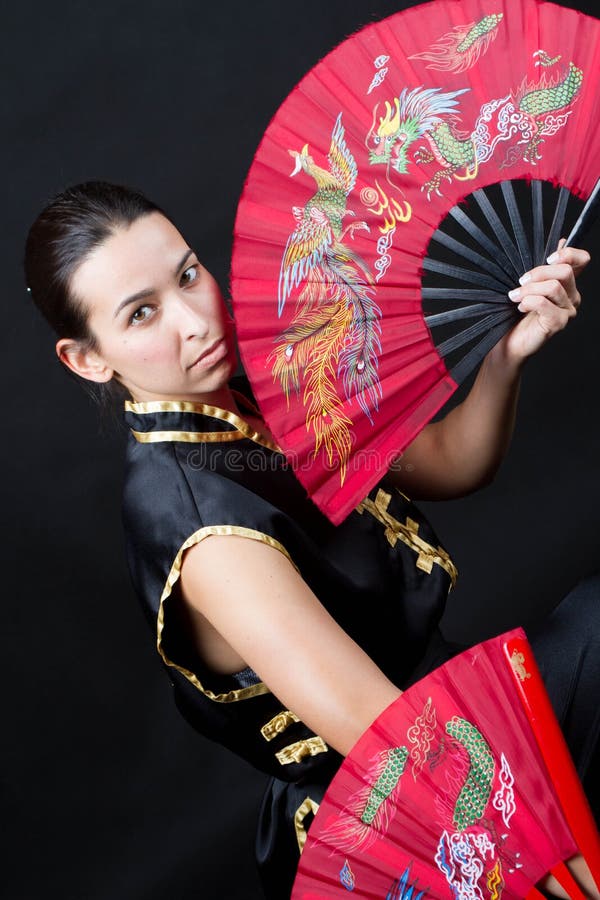 Woman with Kung Fu Red Fans Stock Photo - Image of kung, adult: 26481174