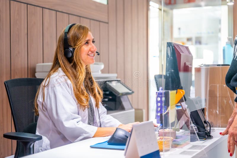 Woman Working in the Reception of an Hospital Stock Image - Image of ...