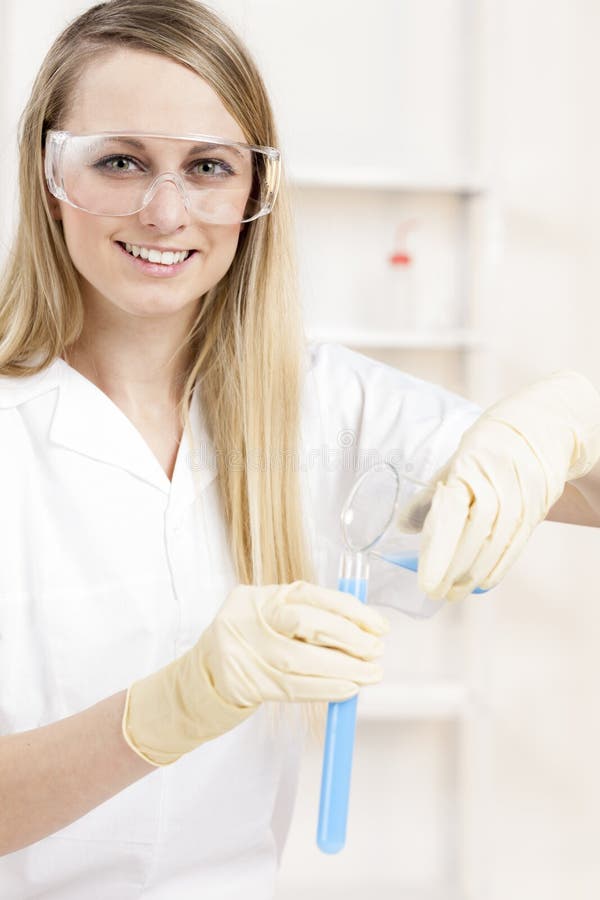 Woman in laboratory stock image. Image of gloves, examine - 26732933