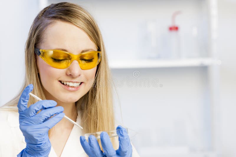 Woman in laboratory stock photo. Image of adult, female - 26732940