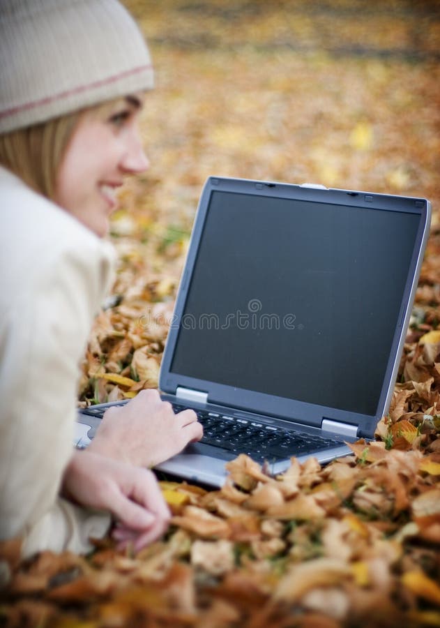 Woman and laptop stock photo. Image of people, grassland - 295396