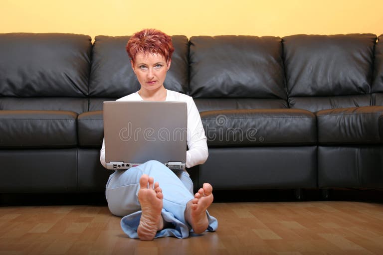Woman on a Laptop 3 stock photo. Image of crossed, brown - 1247404