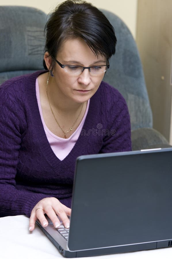 Woman on laptop and phone stock image. Image of details - 8268825