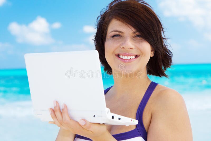 Woman with Laptop Computer on the Beach Stock Image - Image of pretty ...