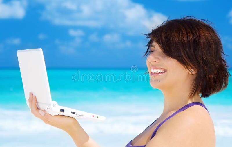 Woman with Laptop Computer on the Beach Stock Photo - Image of modern ...