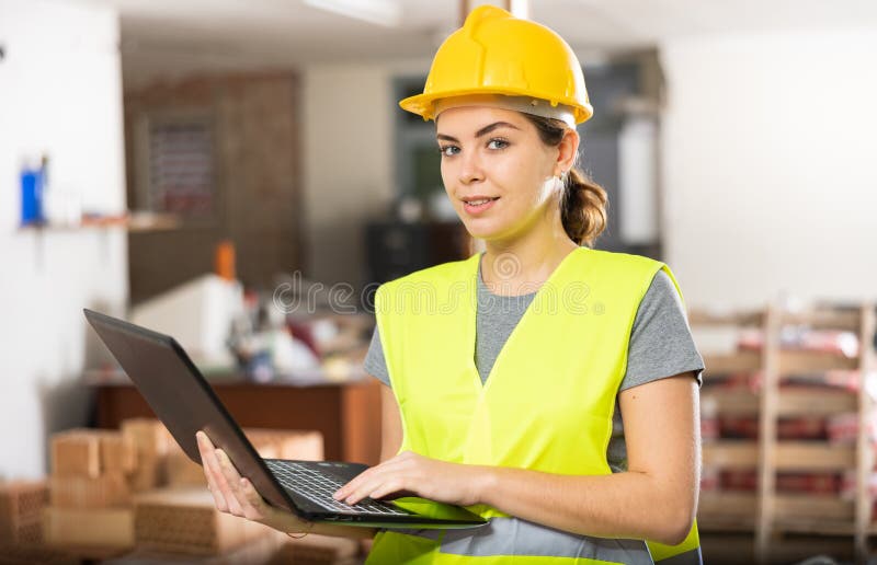 Woman with Laptop on Indoor Construction Site Stock Image - Image of ...