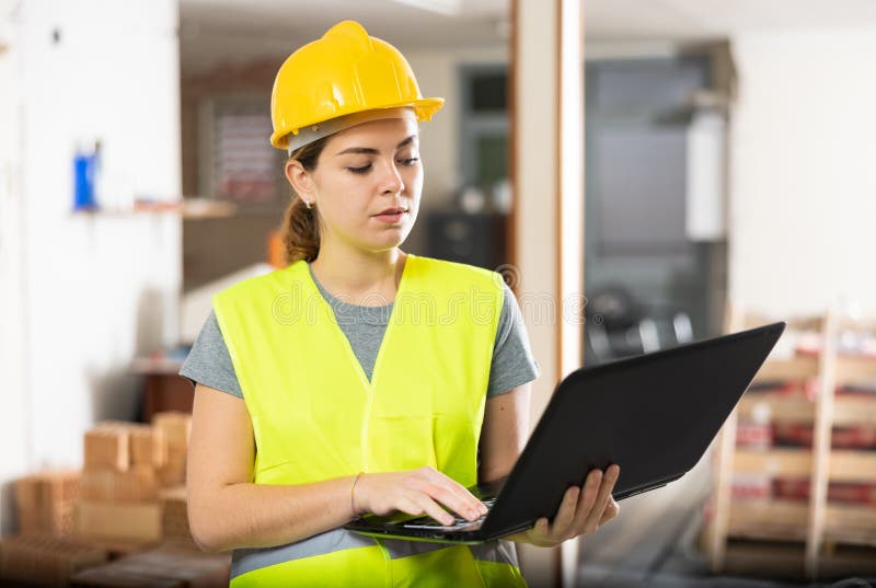 Woman with Laptop on Indoor Construction Site Stock Image - Image of ...