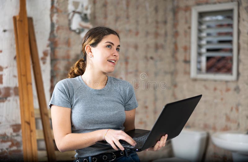 Woman with Laptop on Indoor Construction Site Stock Photo - Image of ...