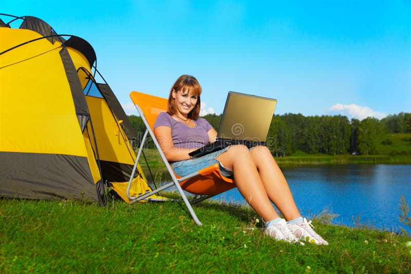 Camping with Laptop by Lake Stock Photo - Image of camping, nature ...