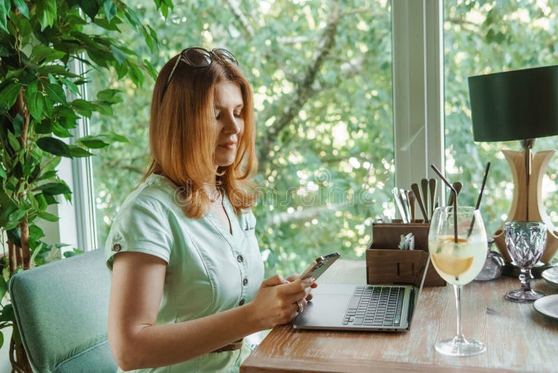 A Woman with a Laptop is Studying Human Design. the Concept of Studying ...