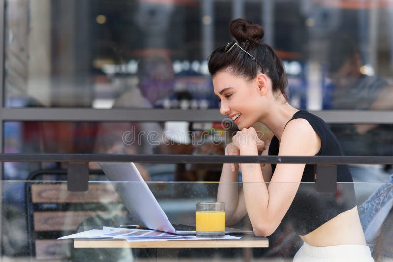 Woman Laughing while Looking into Her Computer Stock Image - Image of ...