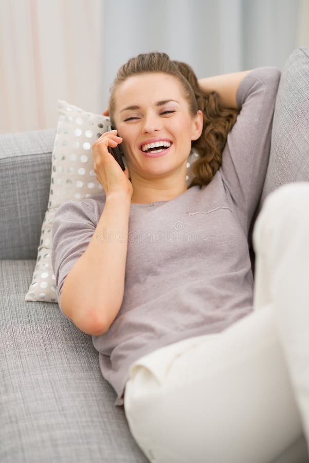 Woman Laying on Sofa and Talking Mobile Phone Stock Image - Image of ...