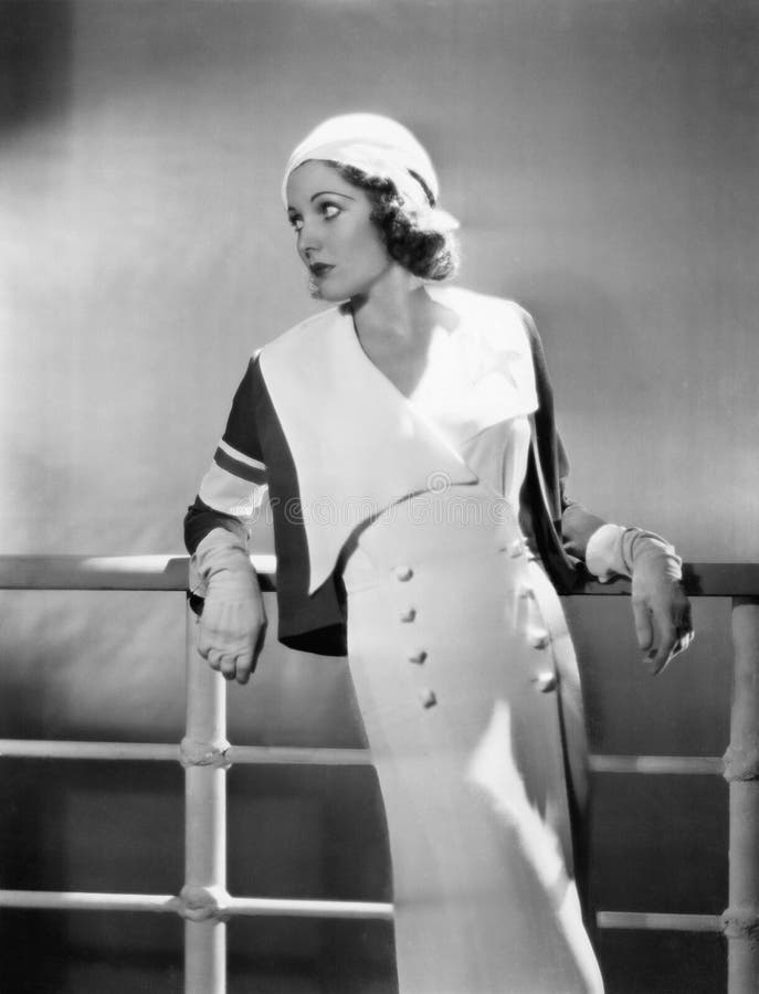 Woman Leaning Against Railing Stock Photo - Image of adult, female ...