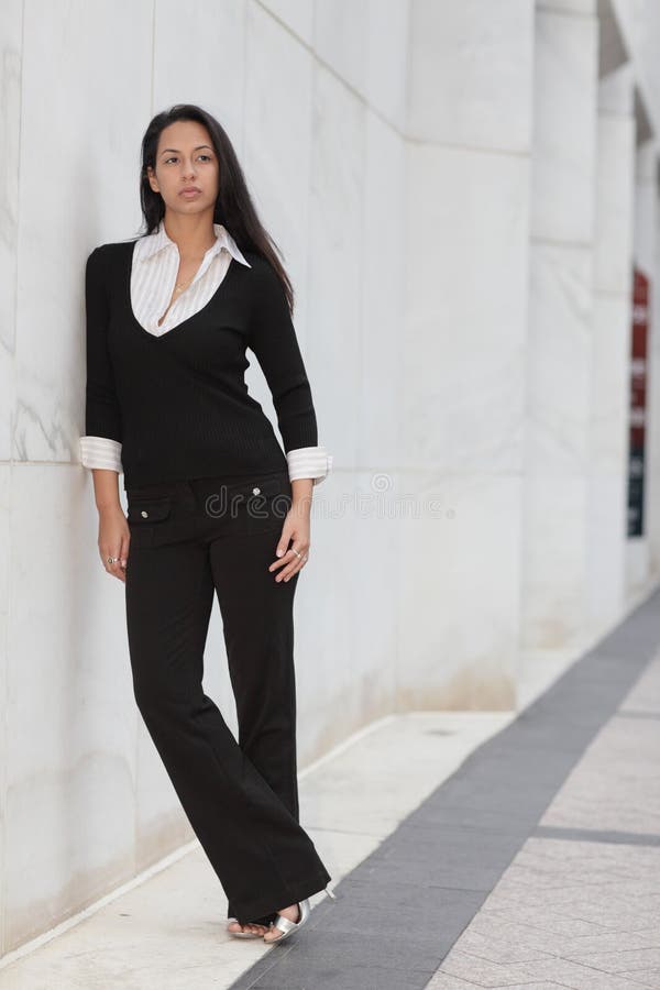 Woman Leaning on a Building Stock Image - Image of outside, lowcut ...