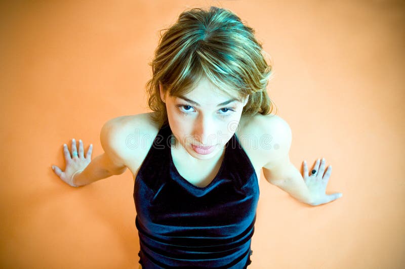 Woman Sitting Down, Glancing Back Stock Image - Image of cute ...