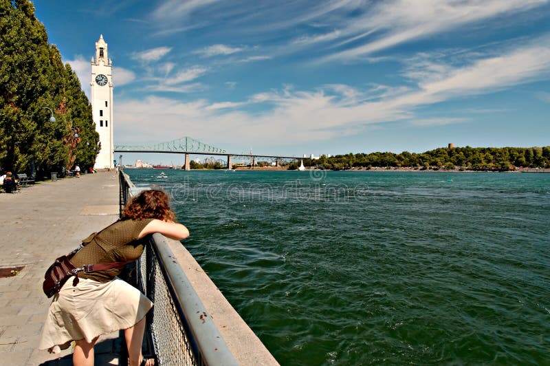Woman Leaning on Rail Overlooking the St Lawrence Stock Image - Image ...
