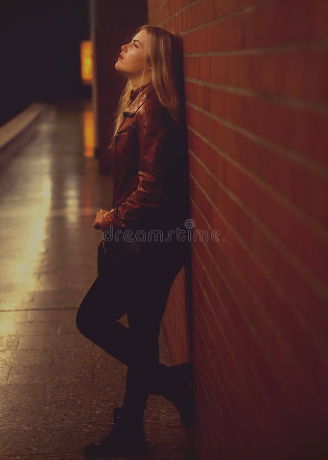 Woman Leaning On Wall Picture. Image: 109911319