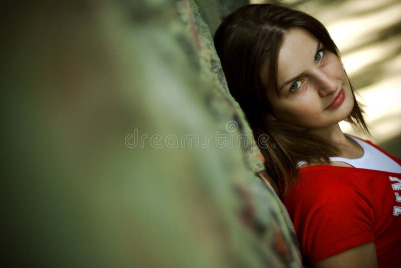 Woman leaning on wall stock image. Image of focus, adult - 3197181
