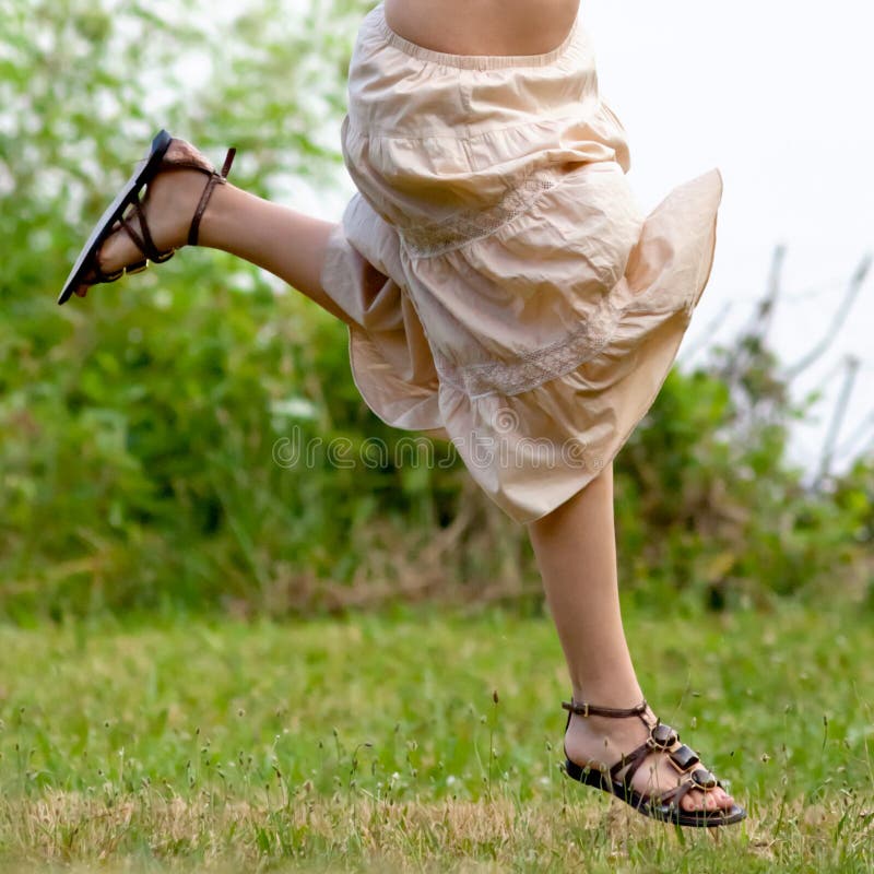 Woman Leaping in Field stock image. Image of hippie, long - 25852297