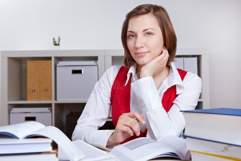 Woman learning with books stock image. Image of listen - 25222629