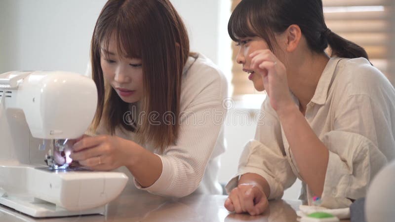 A Woman Learning How To Use a Sewing Machine Stock Video - Video of ...