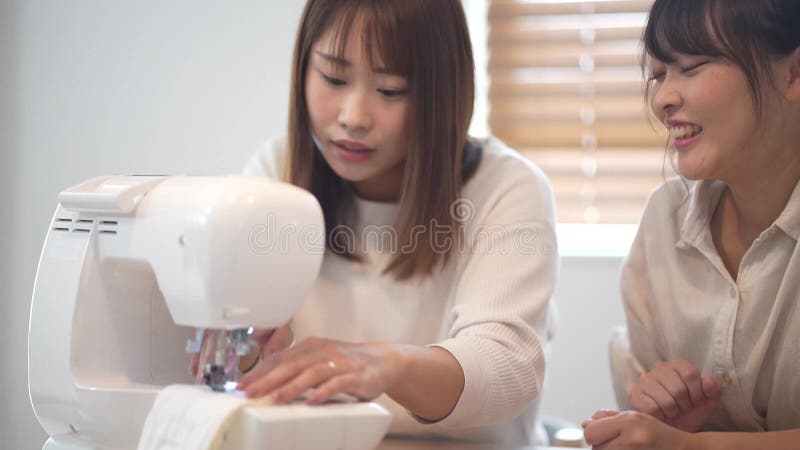 A Woman Learning How To Use a Sewing Machine Stock Video - Video of ...