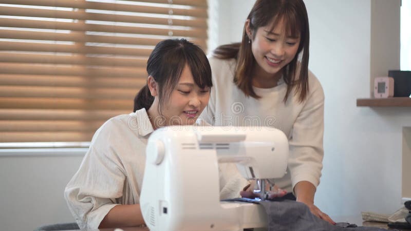 A Woman Learning How To Use a Sewing Machine Stock Video - Video of ...
