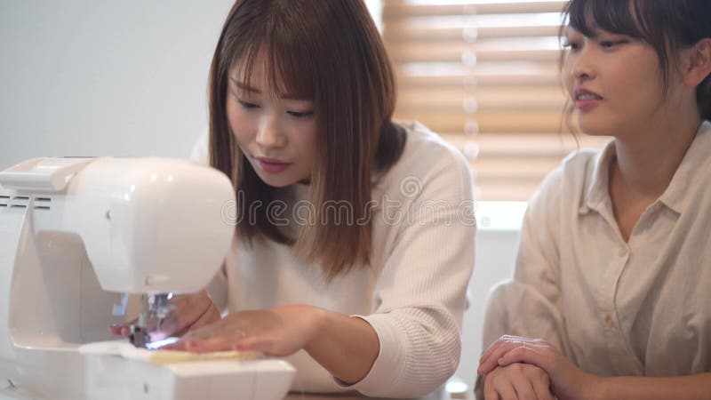 A Woman Learning How To Use a Sewing Machine Stock Video - Video of ...