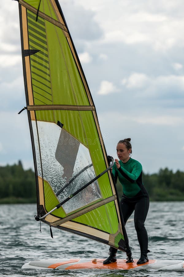 Woman Learning How To Windsurf Stock Image - Image of windsurfing ...