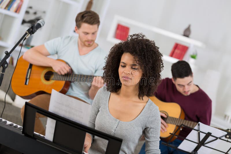 Woman Learning Music Instrument with Friends Stock Image - Image of ...