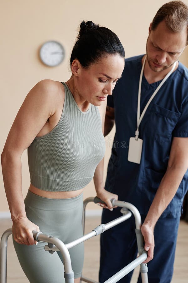 Woman Learning To Walk Using Walker Stock Image - Image of medical ...