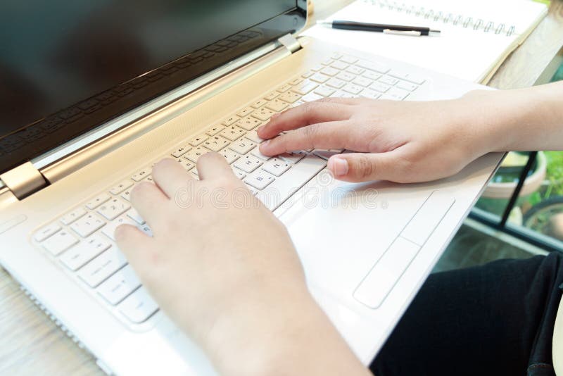Woman Learning and Typing on the Laptop Keyboard Concept Stock Photo ...