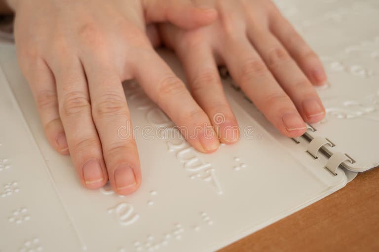 A Woman Learns the Braille Alphabet Using a Decoder. Stock Image ...
