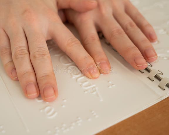 A Woman Learns the Braille Alphabet Using a Decoder. Stock Image ...