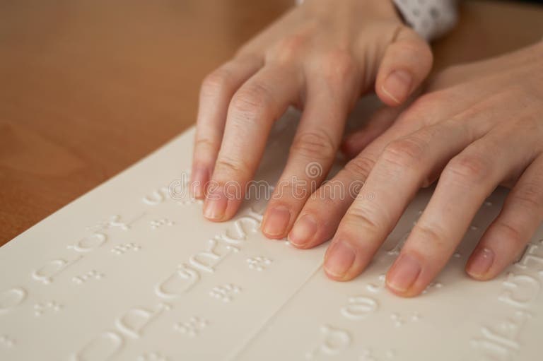 A Woman Learns the Braille Alphabet Using a Decoder. Stock Image ...